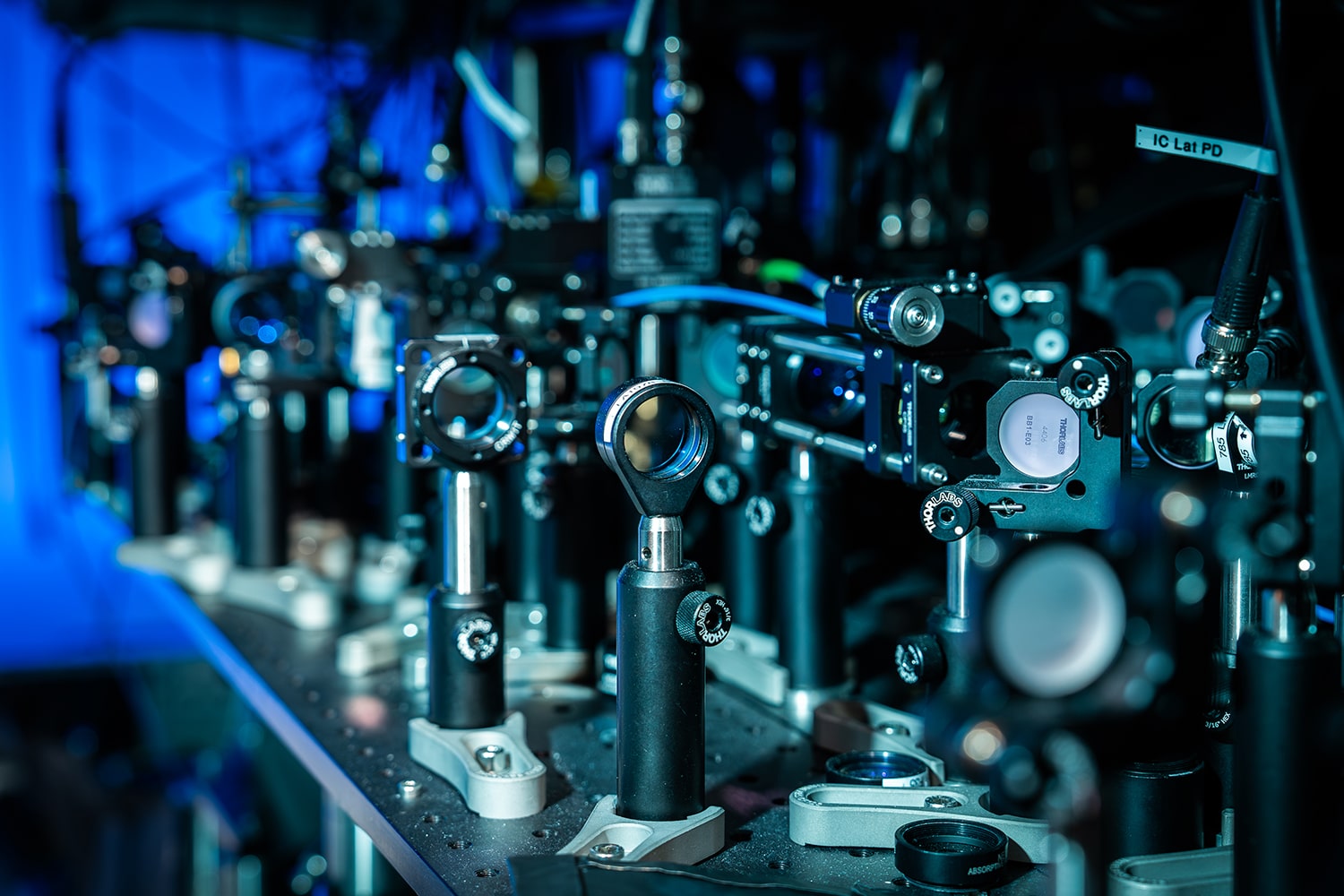 Optical Cavities Enabling Faster Quantum Computing